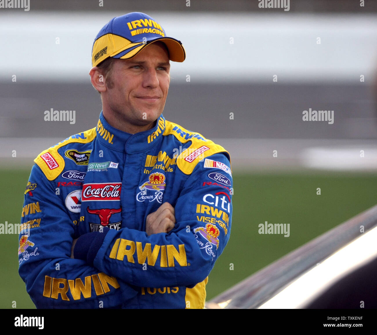 NASCAR driver Jamie McMurray stands by his car on pit road during ...