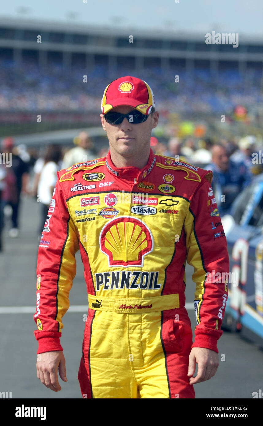 Kevin Harvick walks to his car before the star of the Coca-Cola 600 ...
