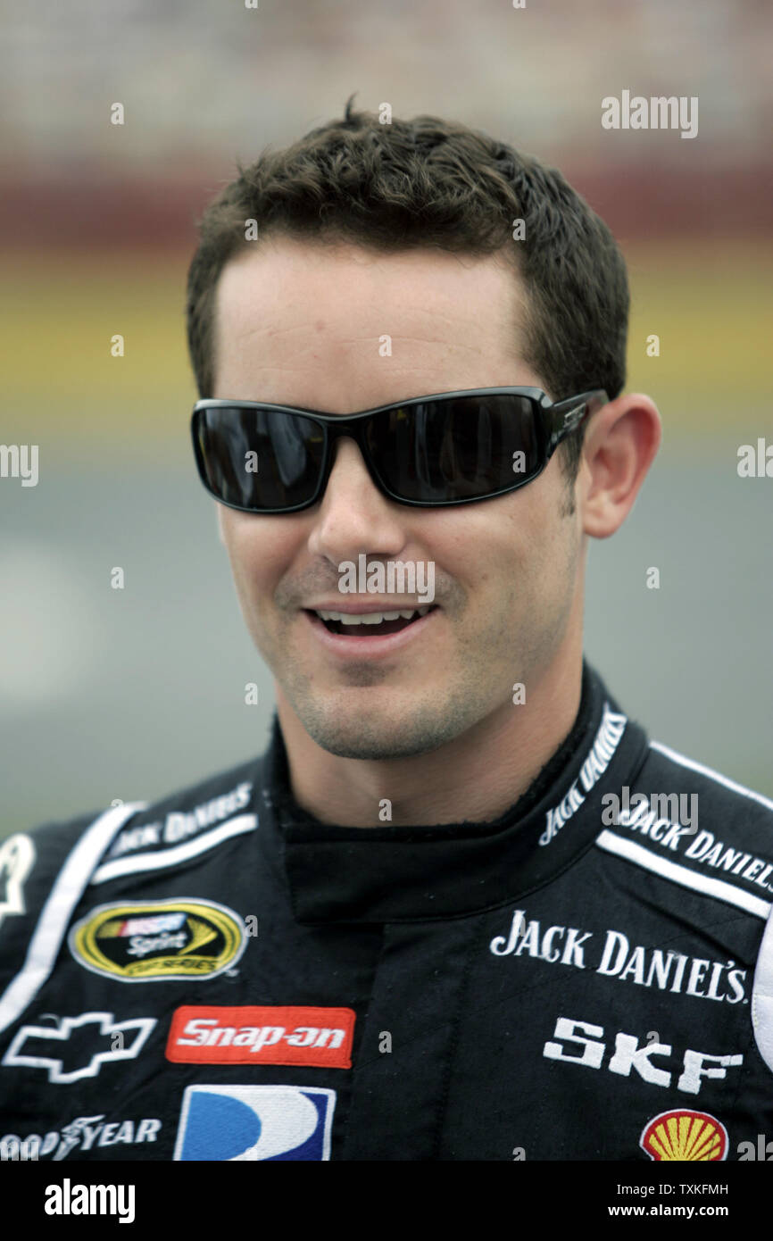 Race car driver Casey Mears talks on pit road before the NASCAR Coca ...