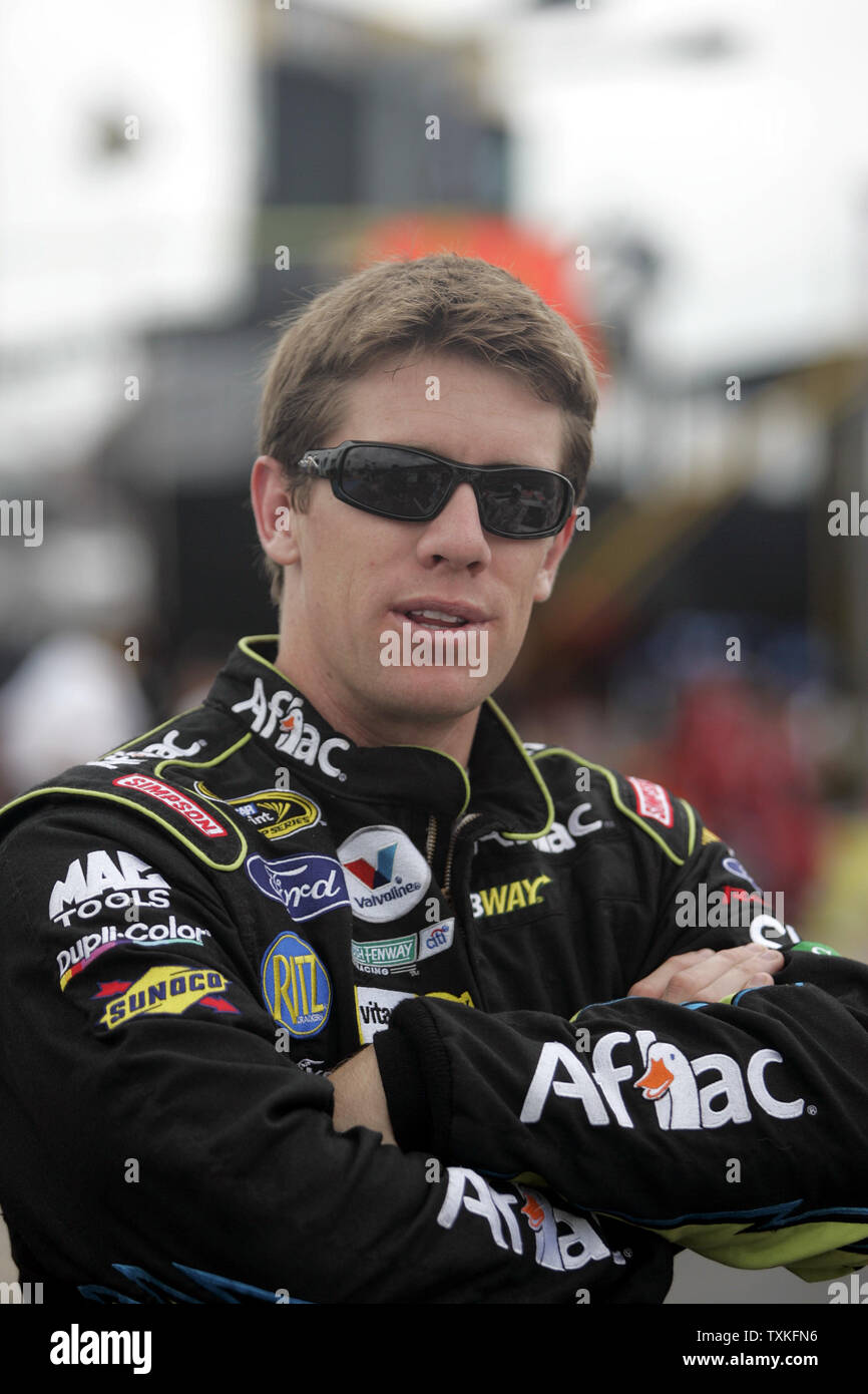 Race car driver Carl Edward waits for the start of the the NASCAR Coca ...