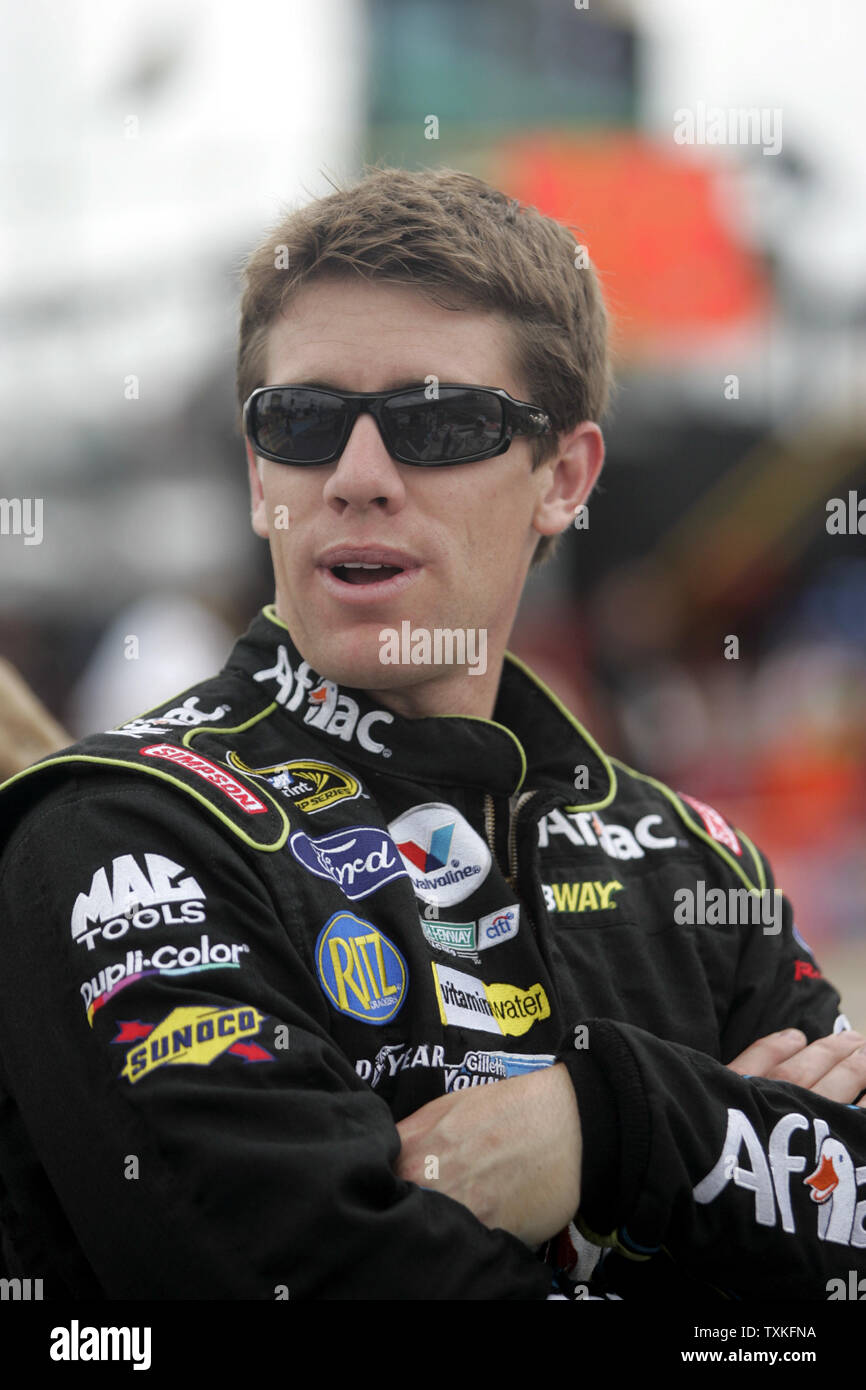 Race car driver Carl Edward waits for the start of the the NASCAR Coca ...