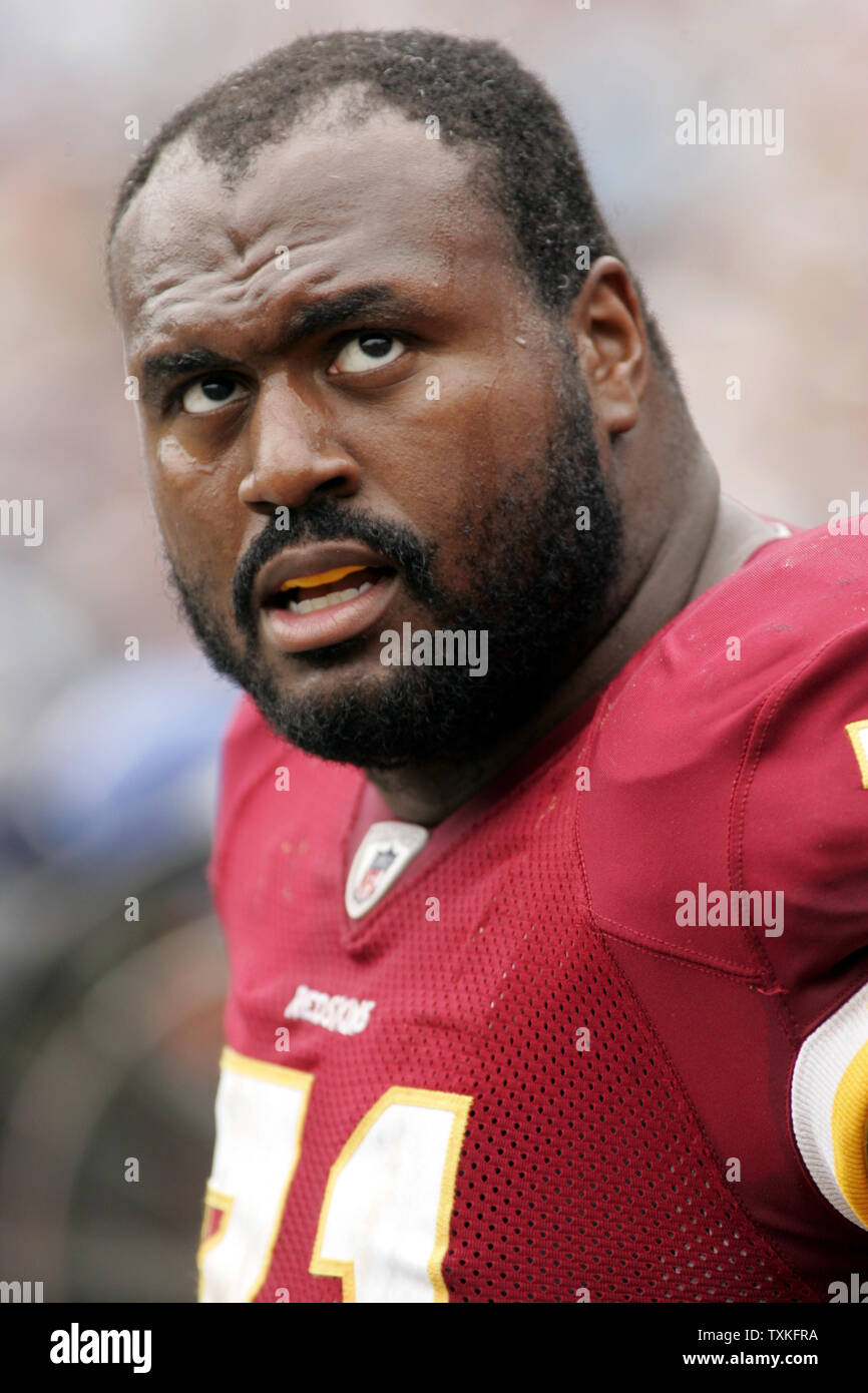 Washington Redskins tackle Mike Williams sits on the bench as the ...