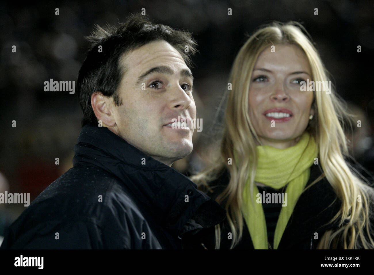 Nascar driver Jimmie Johnson and his wife Chandra Johnson stand ...