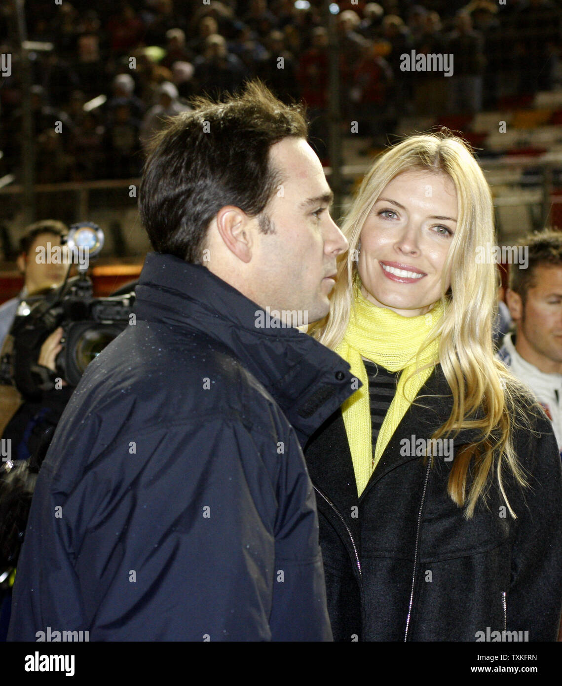 Nascar driver Jimmie Johnson and his wife Chandra Johnson stand ...