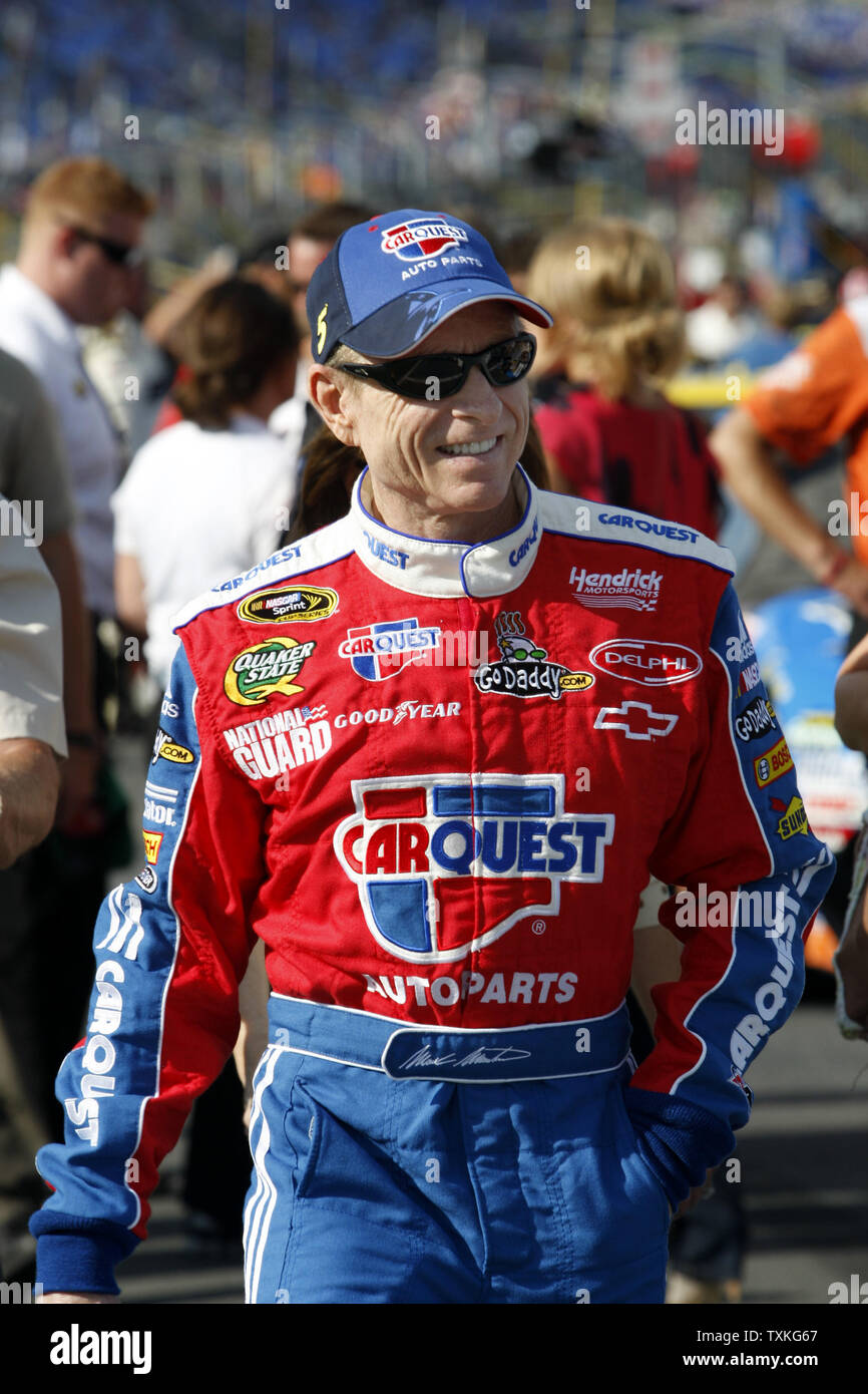 Race car driver Mark Martin walks through the pits before the start of the NASCAR Coca-Cola 600 ...