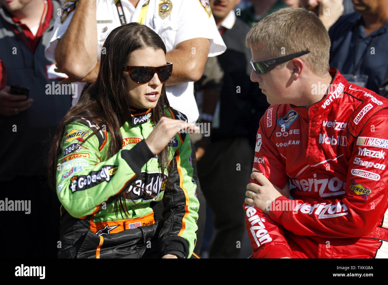 Race Car drivers Danica Patrick, left, and Justin Allgaier talk as they ...