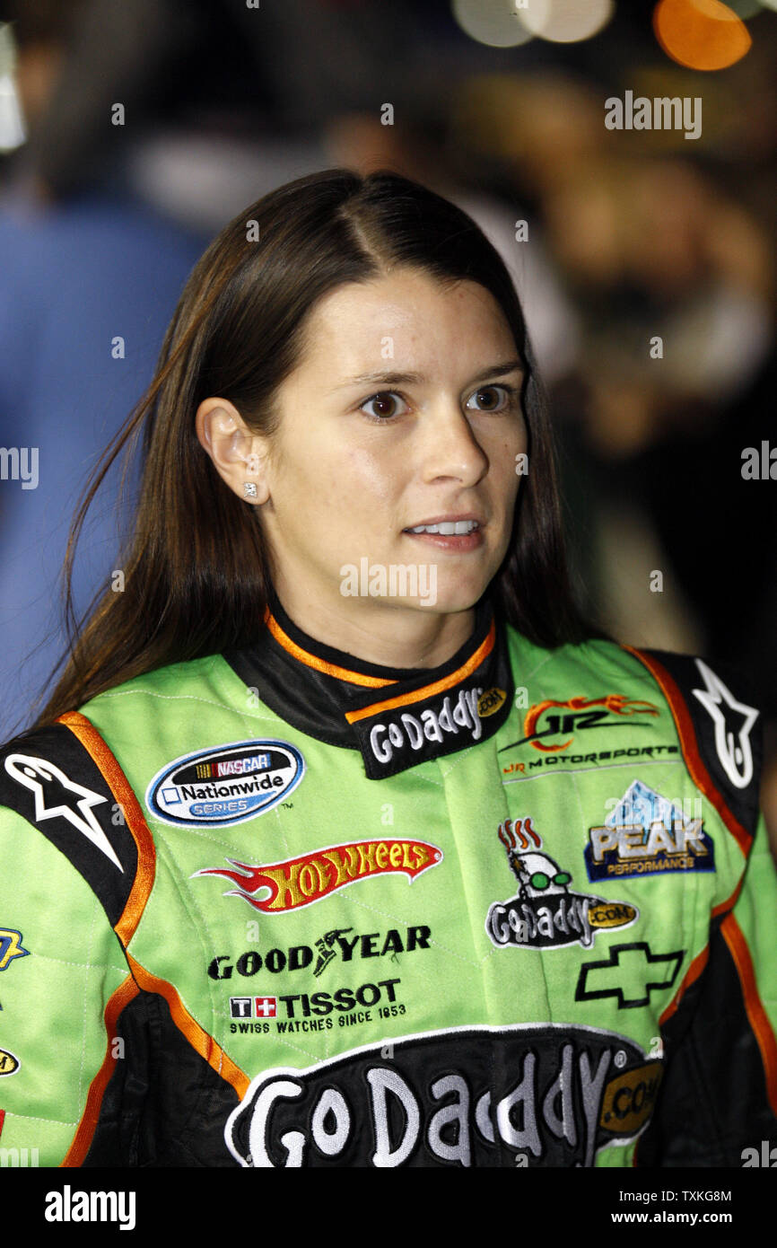 Race Car driver Danica Patrick walks to her car for the start of the ...