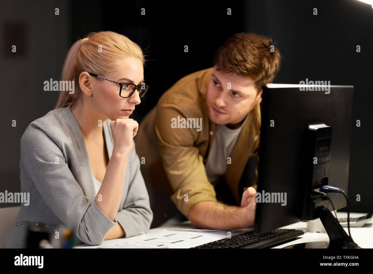 business team with computer at night office Stock Photo - Alamy