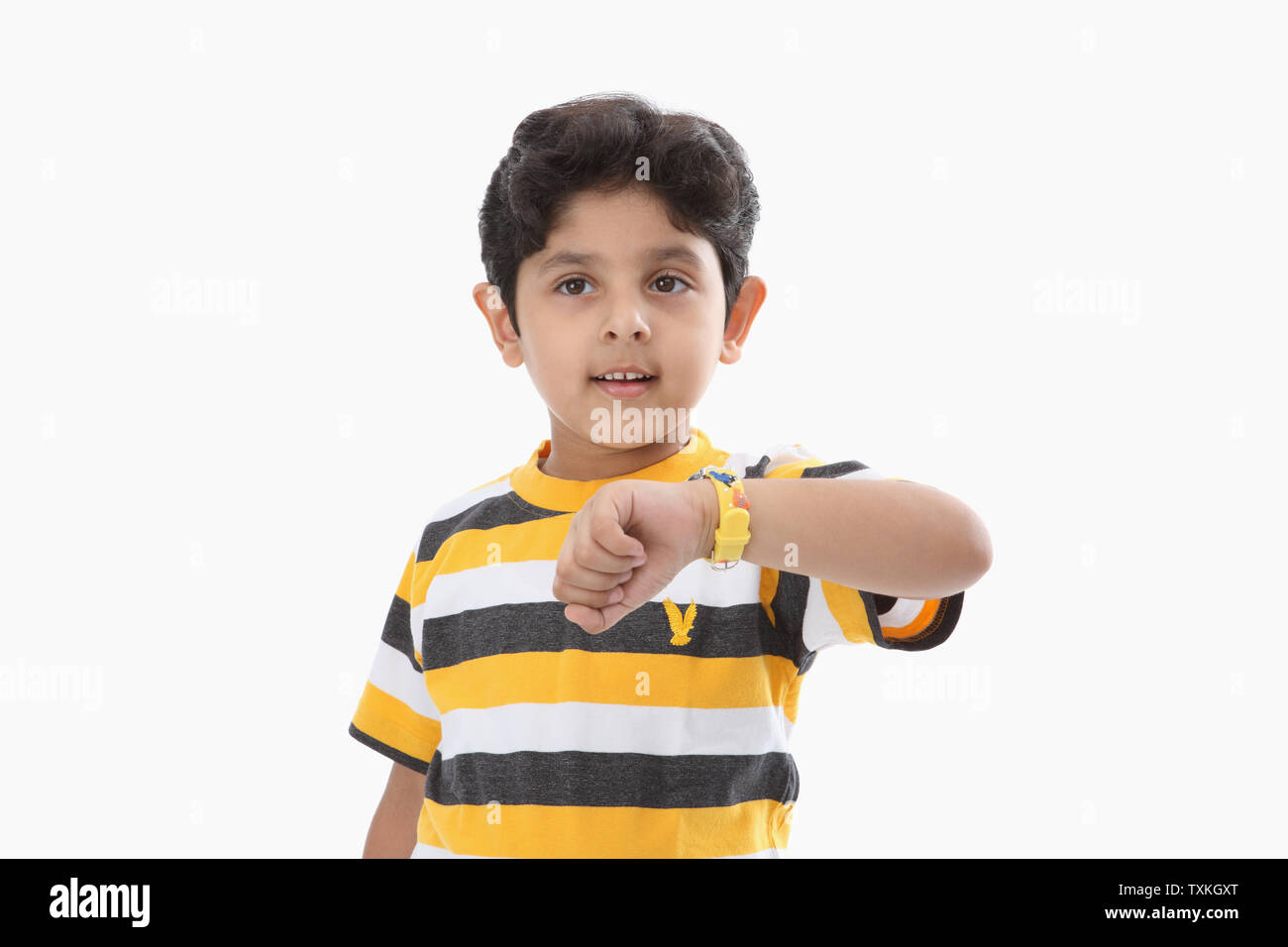 Child looking at watch wristwatch hi-res stock photography and images ...