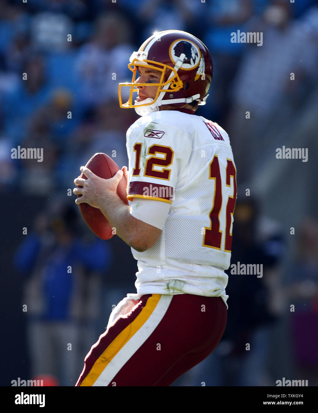 Washington Redskins quarterback John Beck (12) looks to pass against ...