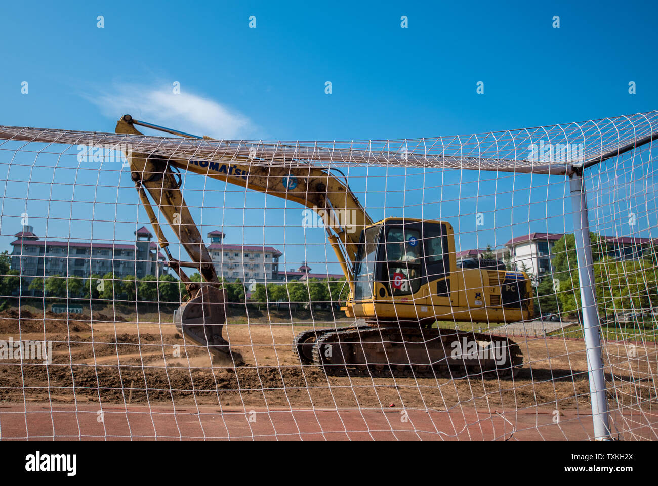 Construction of football field Stock Photo - Alamy