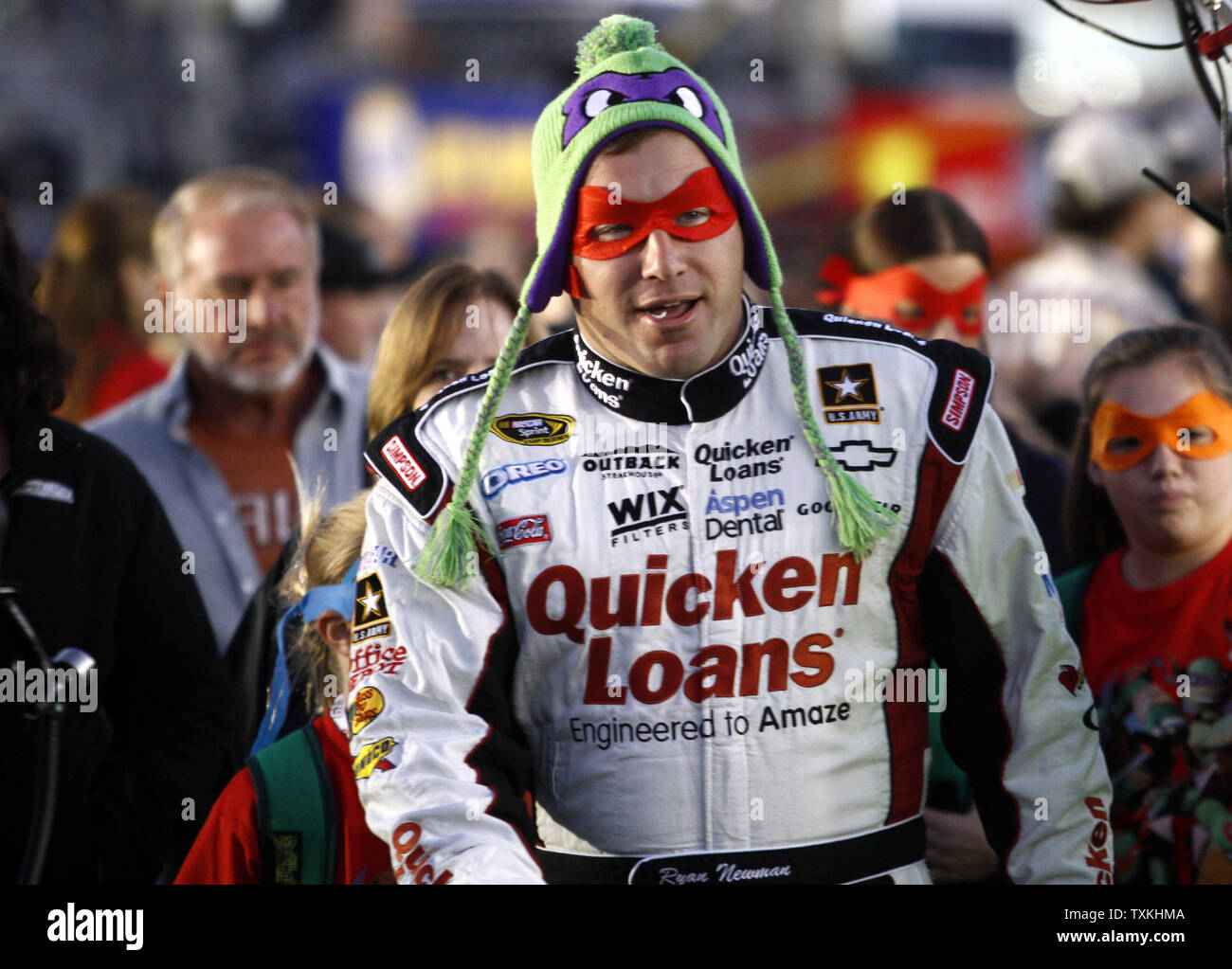 Ryan Newman wears a "Teenage Mutant Ninja Turtle" hat and mask before ...