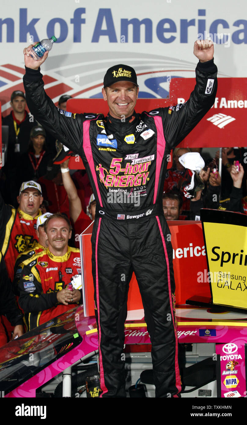 Clint Bowyer celebrates in victory lane after winning the Bank of ...