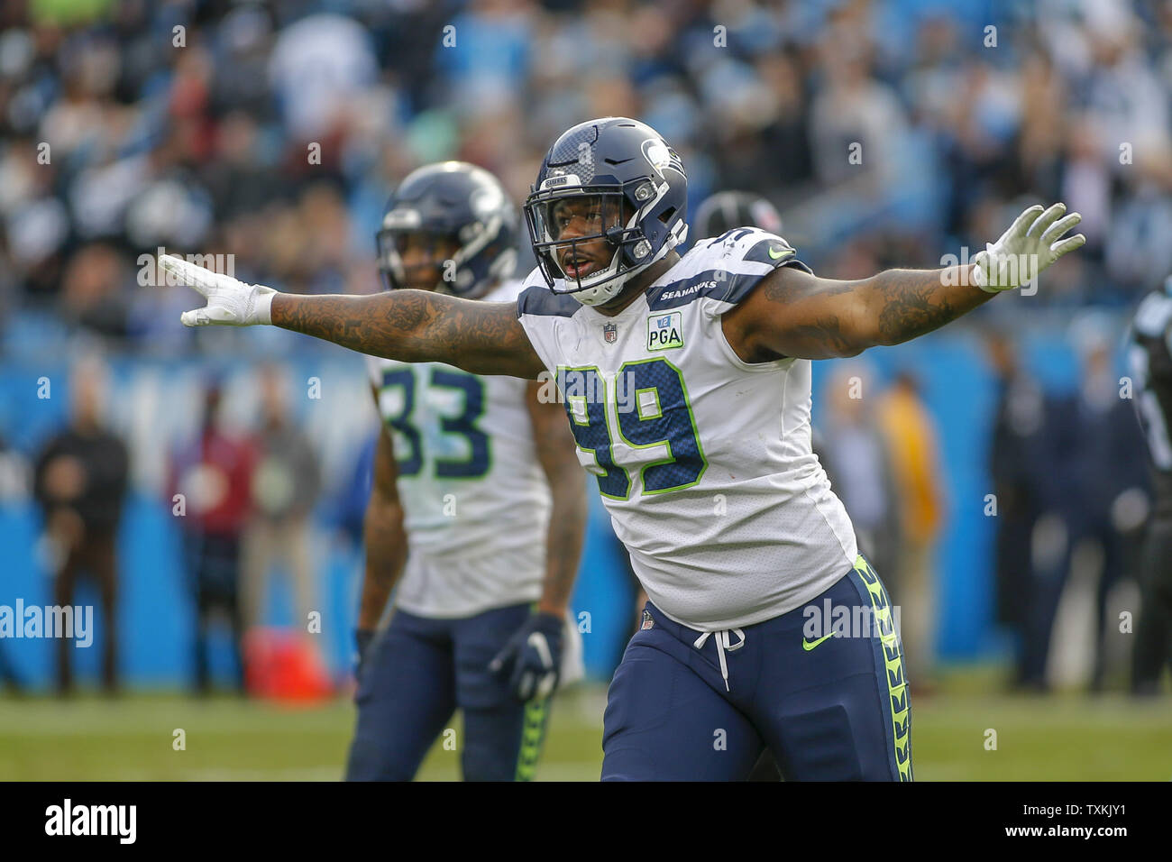 Seattle Seahawks defensive end Quinton Jefferson (99) reacts after the ...