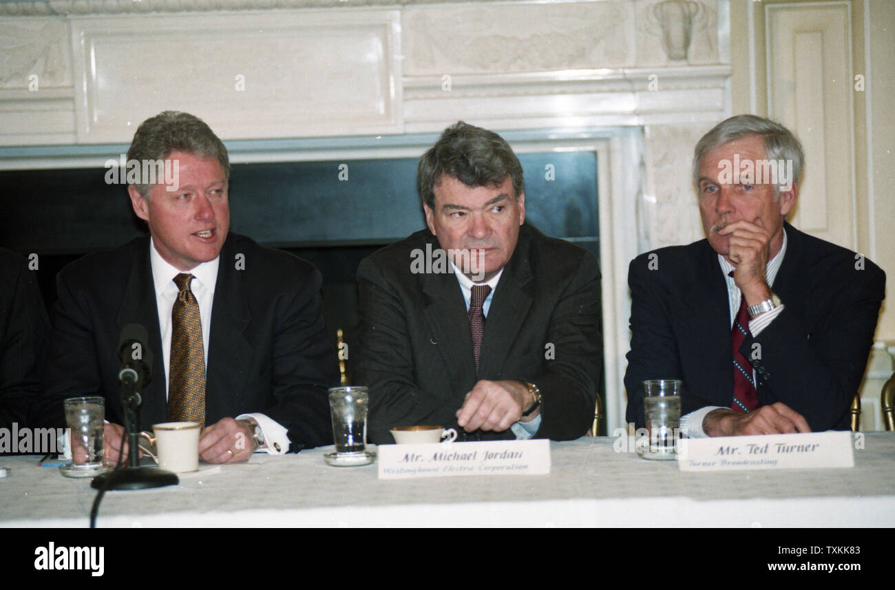 U.S. President Bill Clinton (L) speaks about a television rating system ...