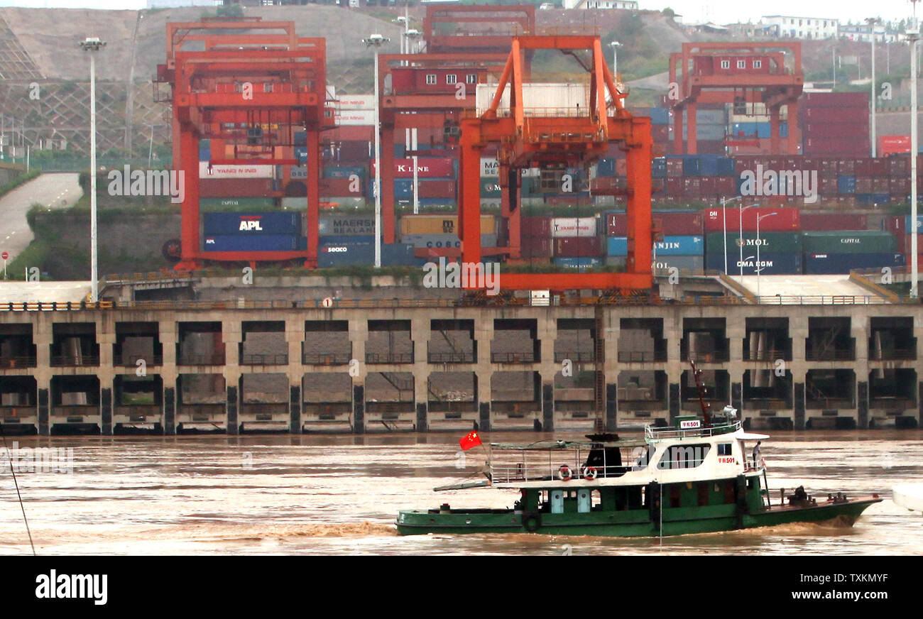 A Chinese patrol boat passes the newly built inland, deep-water ...