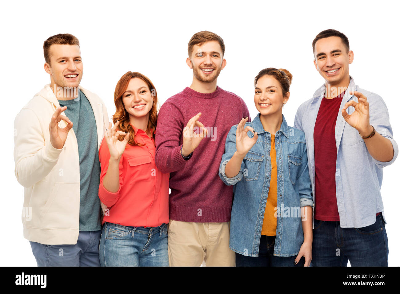group of smiling friends showing ok hands sign Stock Photo - Alamy