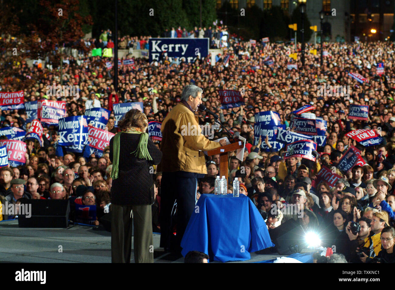 John Kerry and his wife face a late night rally in Cleveland, Ohio, Nov ...