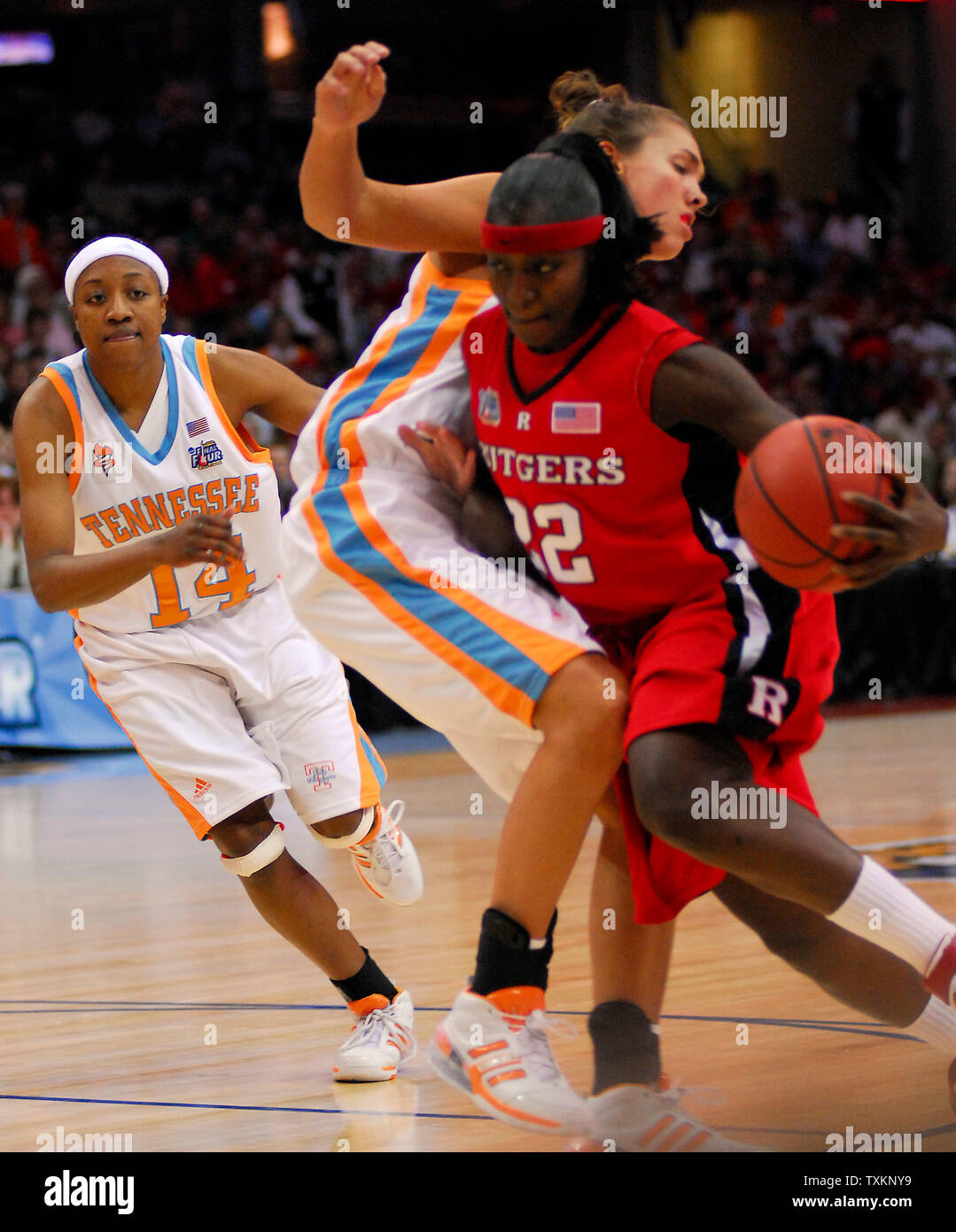 Rutgers Scarlet Knights Mattee Ajavon (22) drives past Tennessee Lady ...