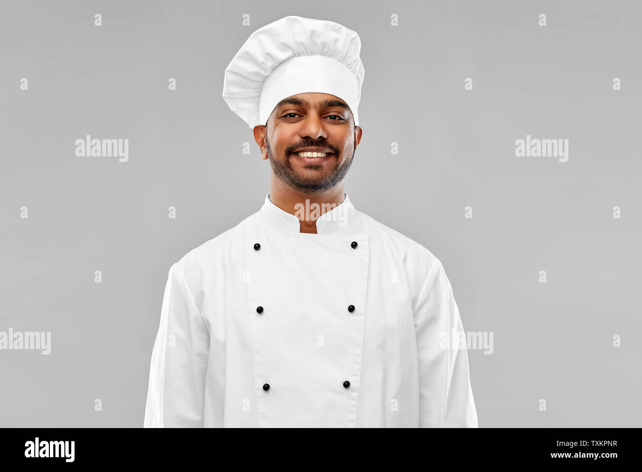 happy male indian chef in toque Stock Photo - Alamy