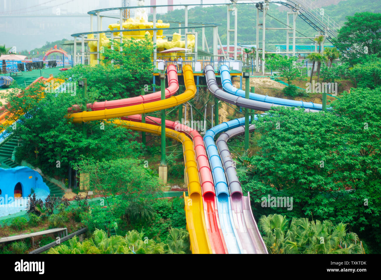 Summer water park, all kinds of slides Stock Photo - Alamy