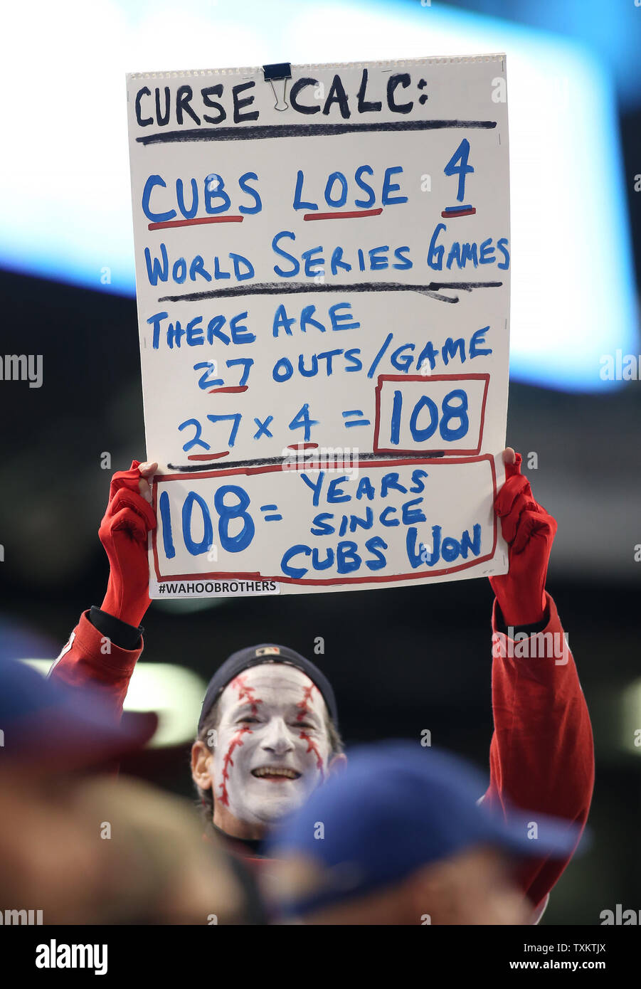 Fan holds curse sign during game 1 of the World Series at Progressive ...