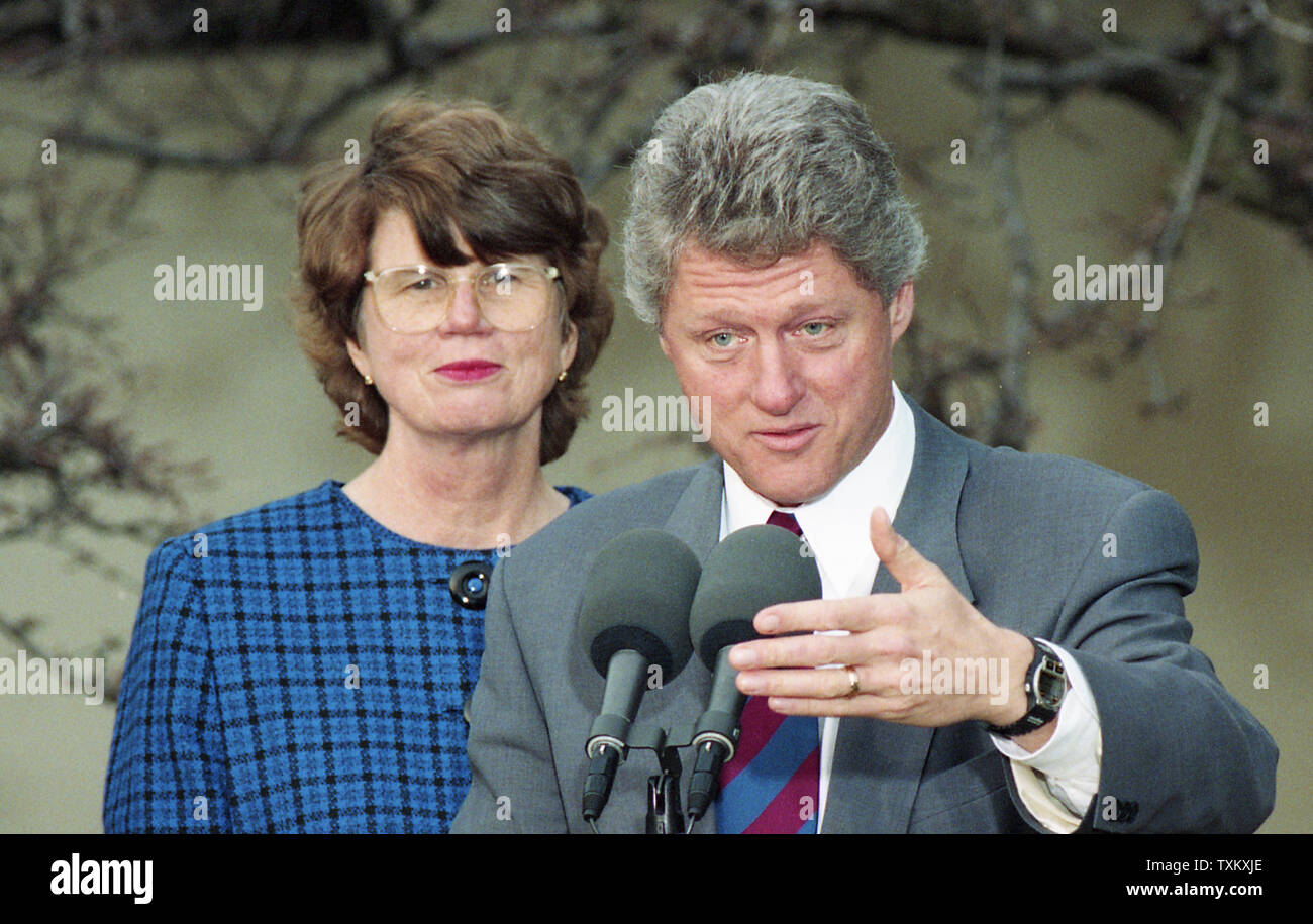 U.S. President Bill Clinton speaks as Janet Reno, the first female ...