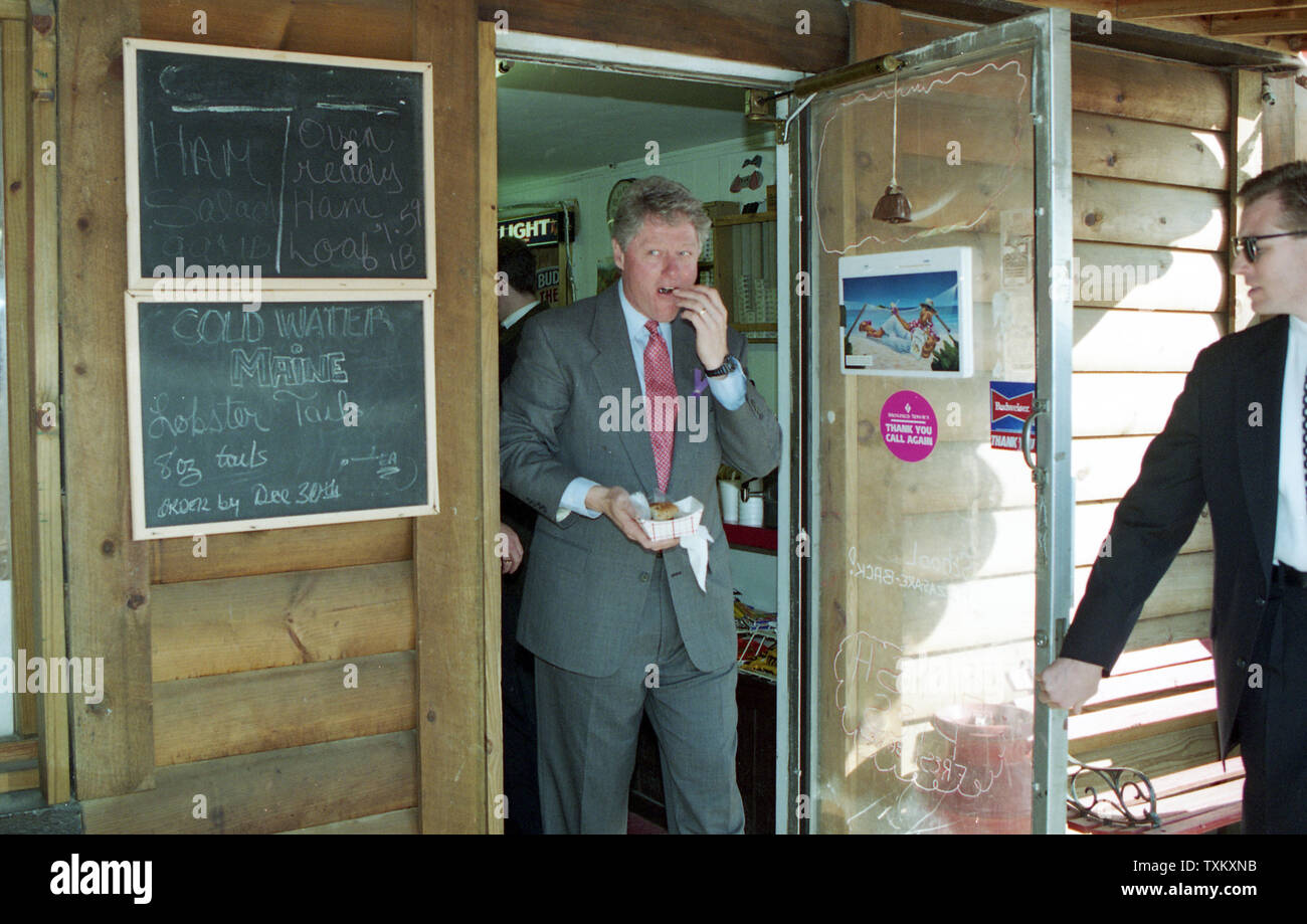 U.S. President Bill Clinton walks out of a restaurant in Ohio on April ...