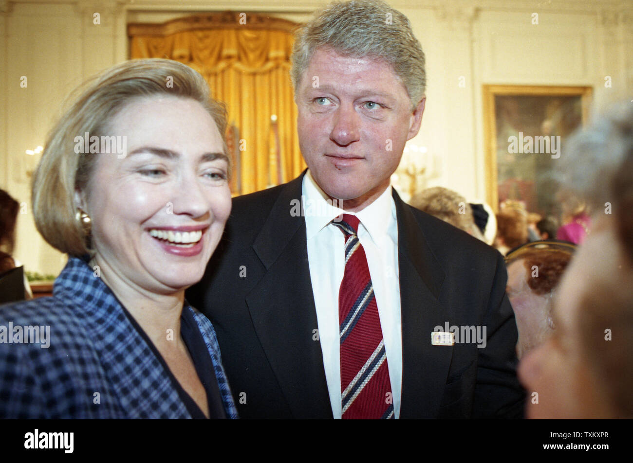 U.S. President Bill Clinton and First Lady Hillary Clinton greet guests ...