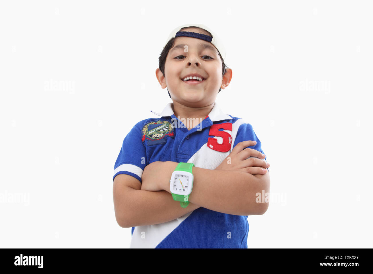 Portrait of boy smiling cross arms hi-res stock photography and images ...