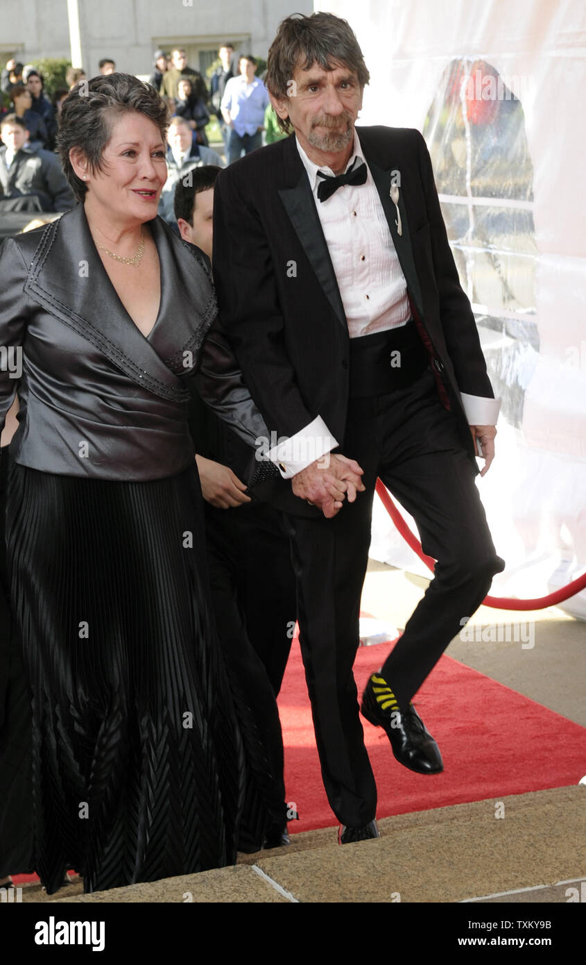 Inductee Dewey Lyndon "Spooner" Oldham (R) and his wife Karen arrive at ...