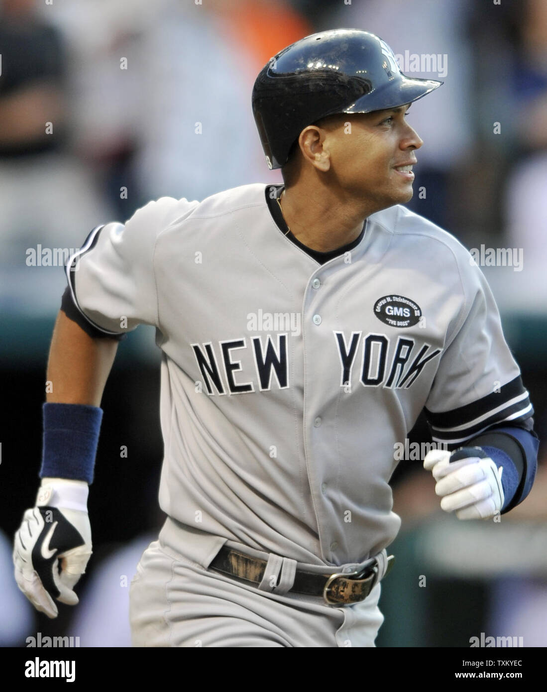 New York Yankees' Alex Rodriguez watches his sacrifice fly with the ...