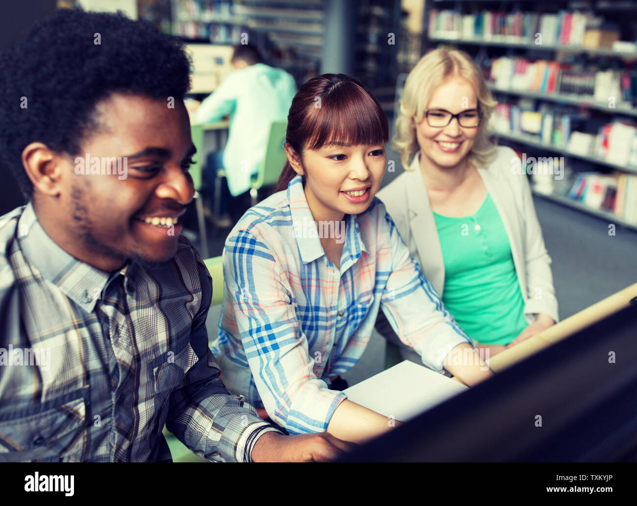 international students with computers at library Stock Photo - Alamy