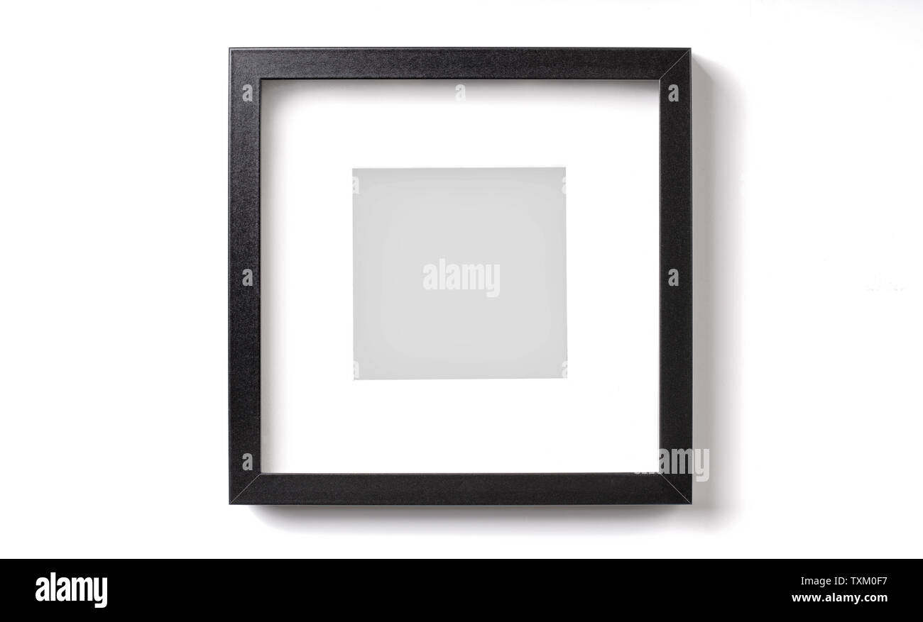 Black square picture frame with shadow on the white wall Stock Photo ...