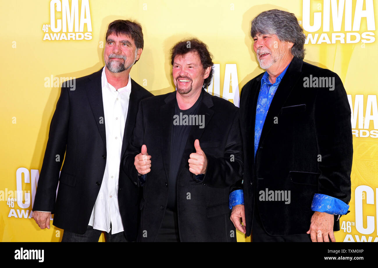 Jeff Cook, Teddy Gentry and Randy Owens of Alabama arrive on the red ...