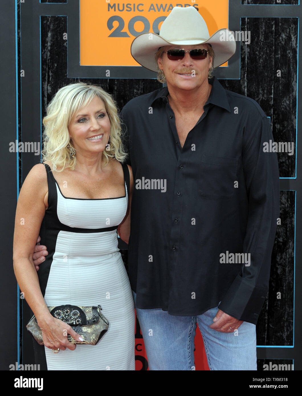 Alan Jackson (R) and wife Denise arrive for the Country Music ...