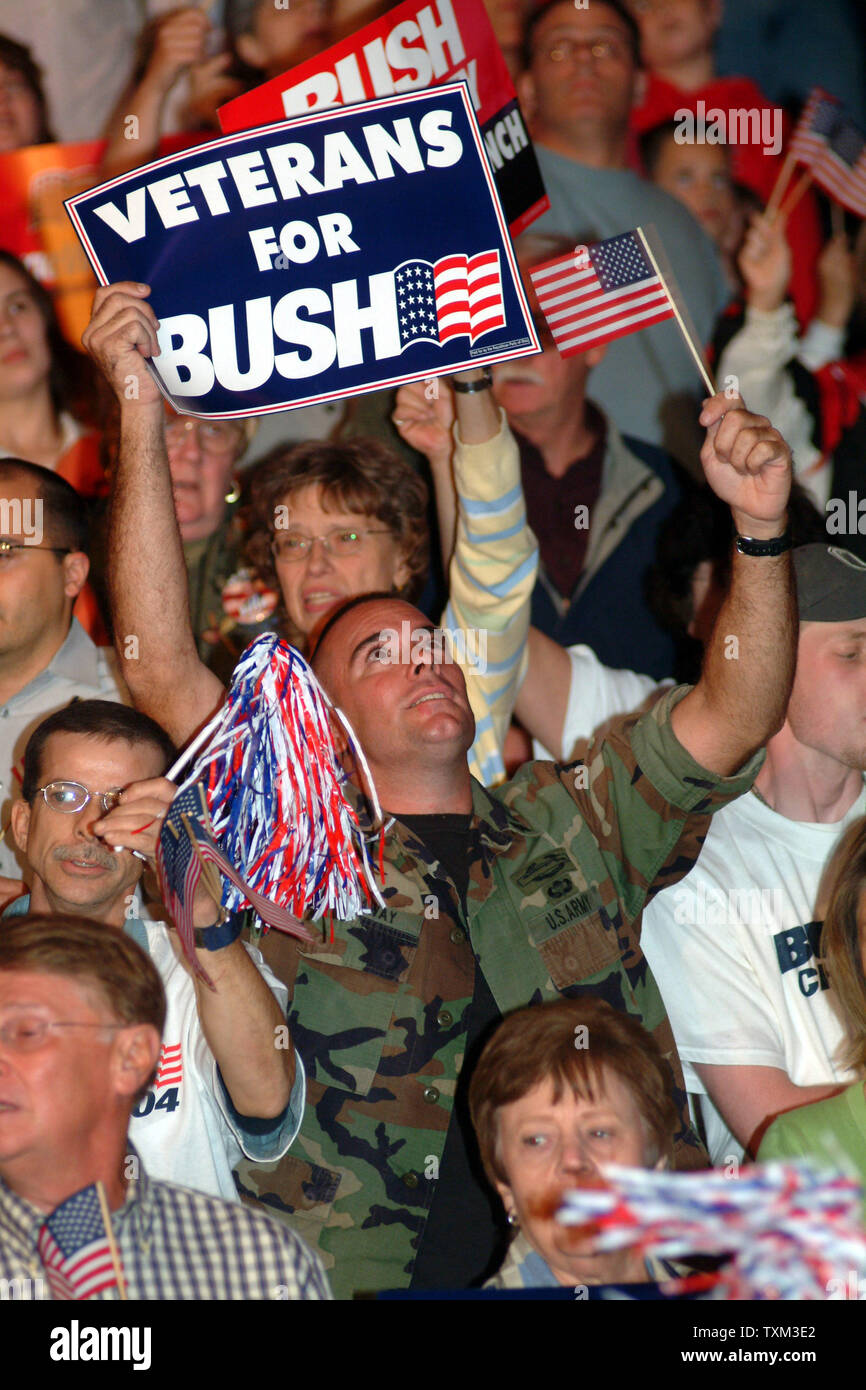 Supporters of President Bush cheer for him during his speach at a ...