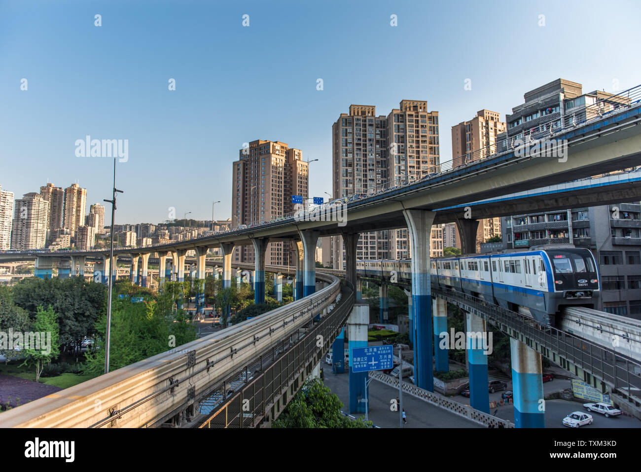 Chongqing light rail train in motion Stock Photo - Alamy
