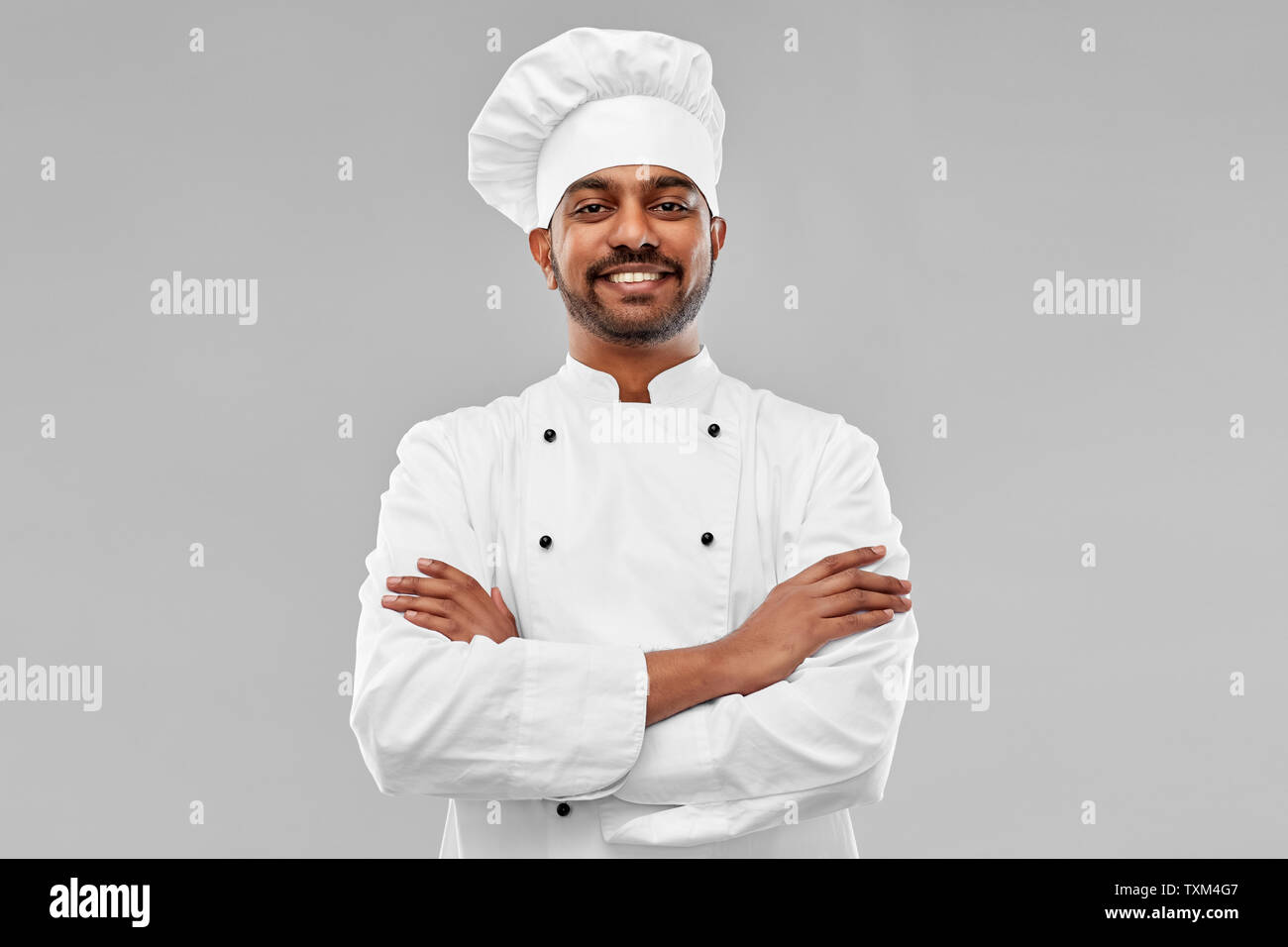happy male indian chef in toque Stock Photo - Alamy