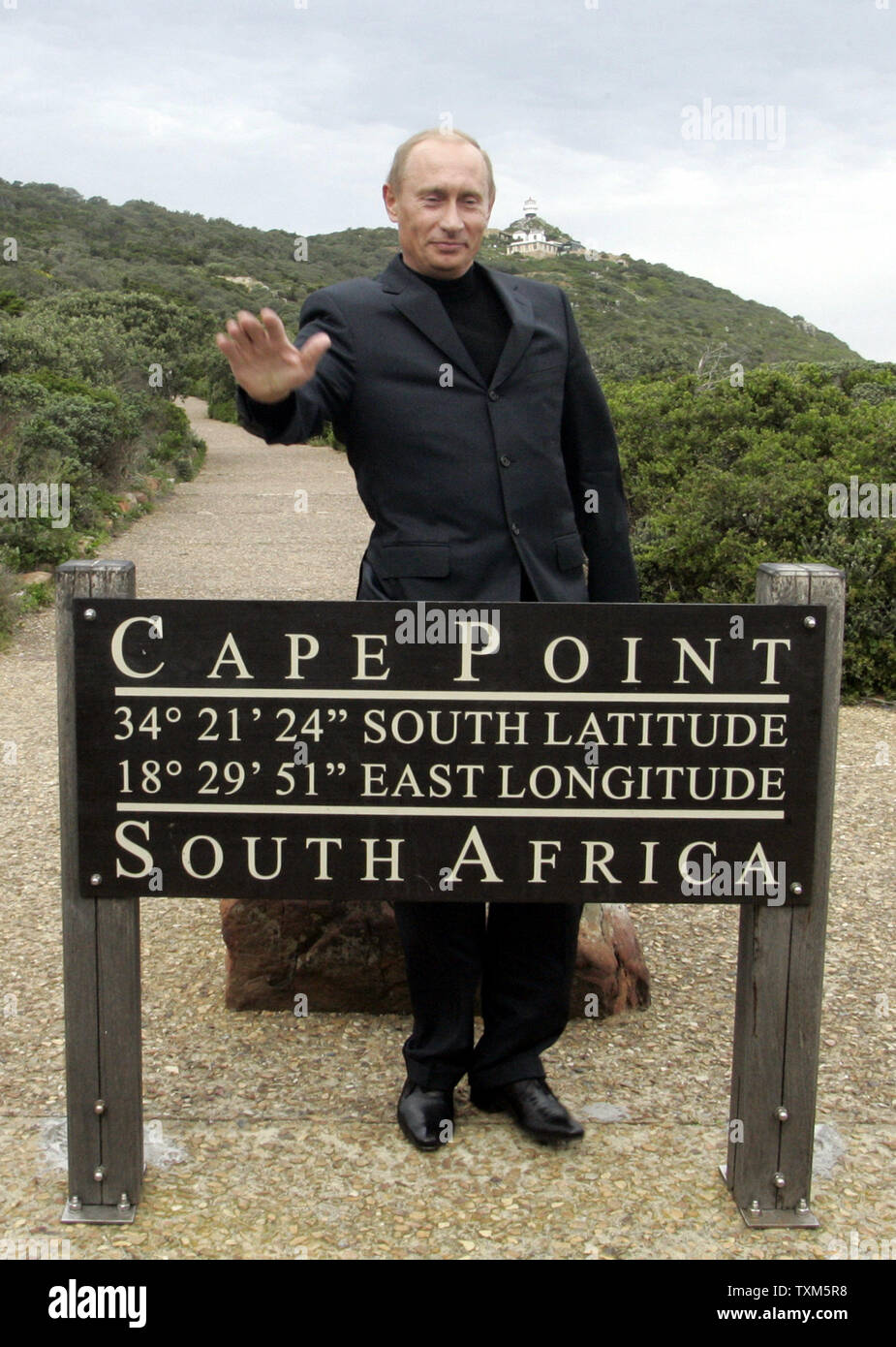 Russian President Vladimir Putin gestures at Cape Point, the most ...