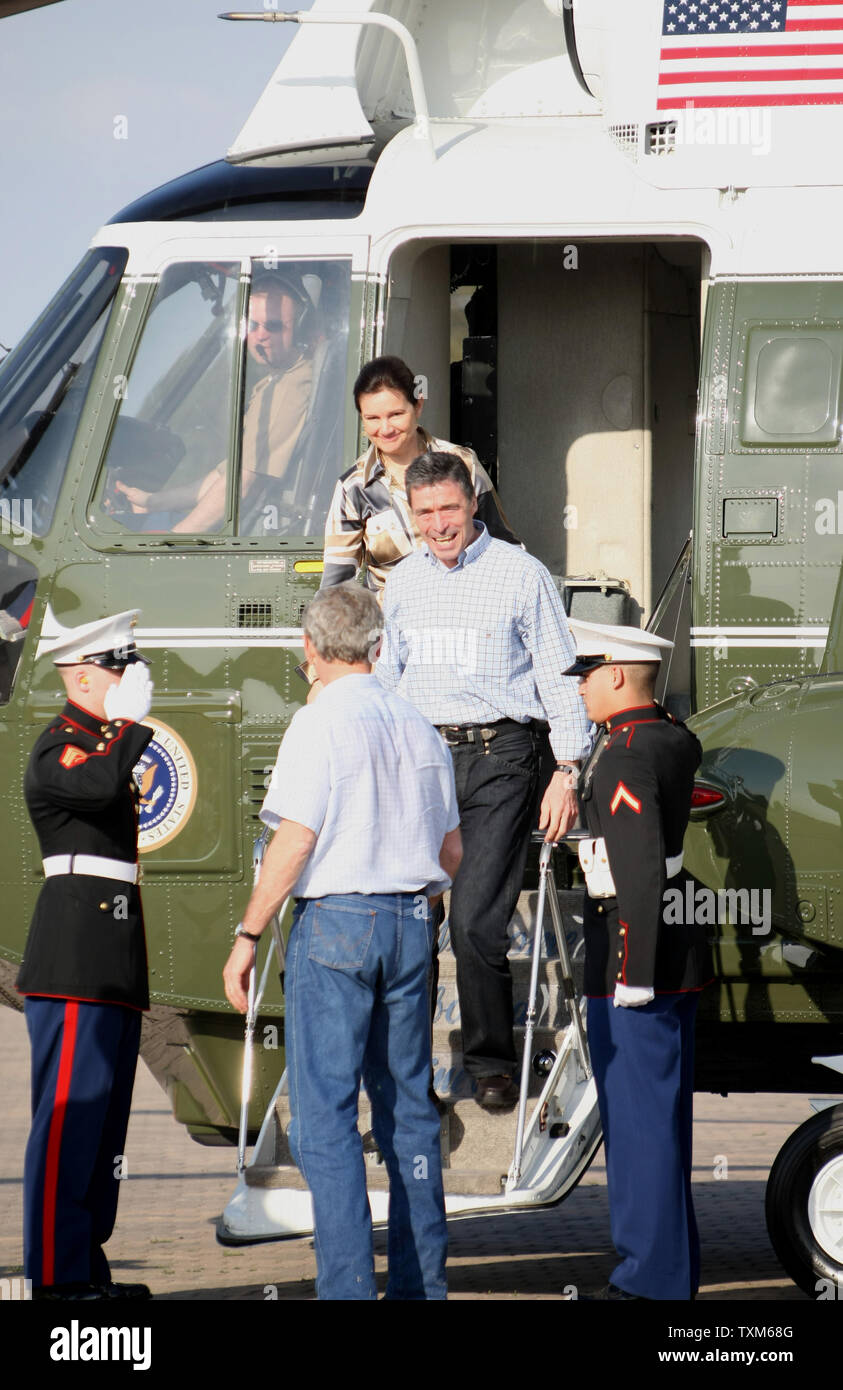 Prime Minister of Denmark Anders Fogh Rasmussen (C) and his wife Anne ...