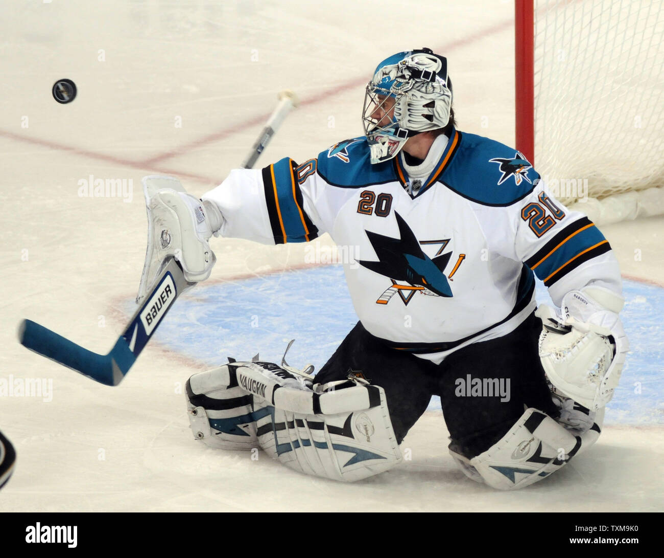 San Jose Sharks goalie Evgeni Nabokov makes one of his 17 saves against ...