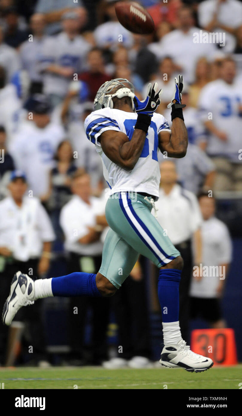 Dallas Cowboys Terrell Owens catches a 72-yard touchdown pass from Tony ...