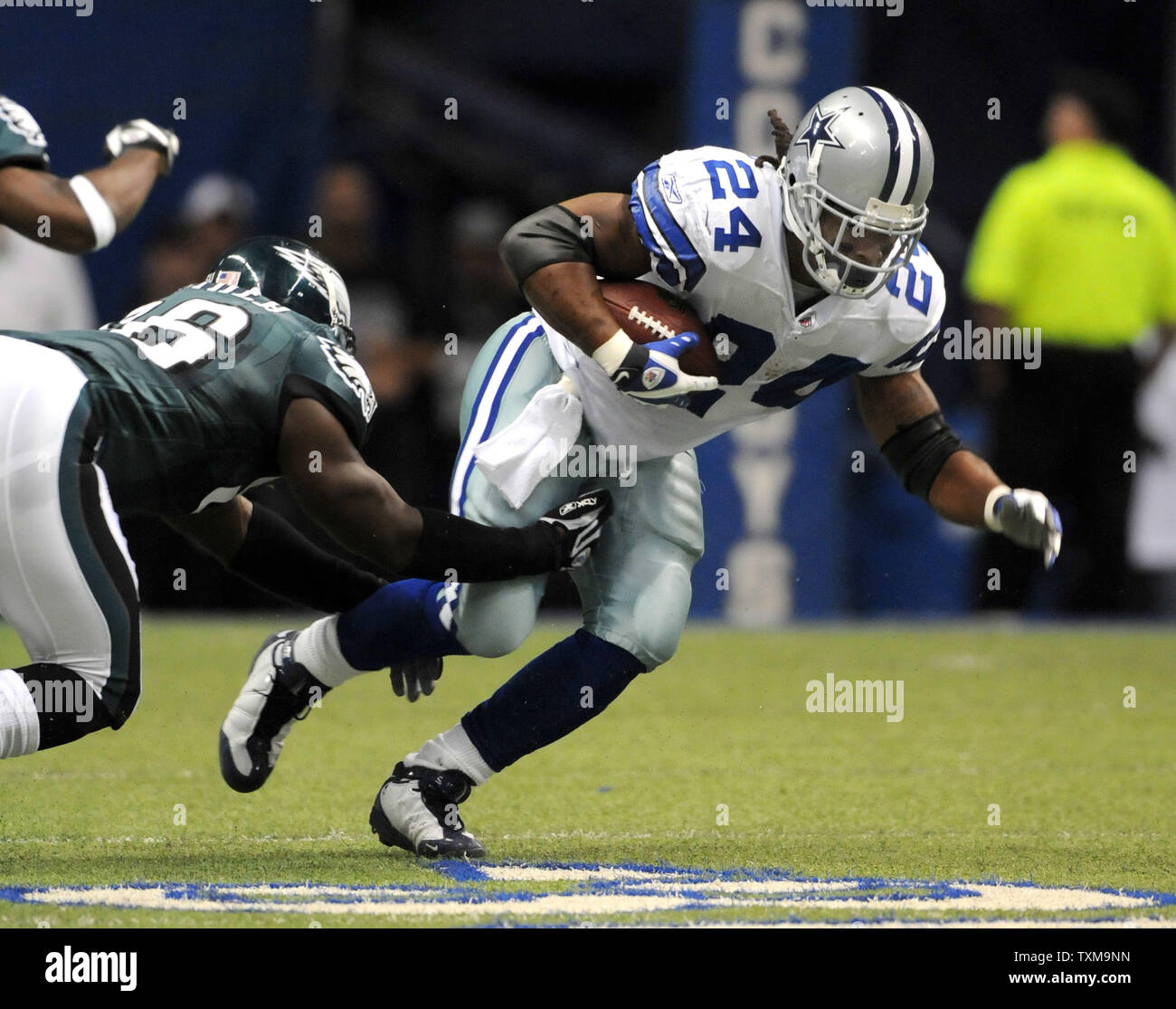 Dallas Cowboys Marion Baber rushes past Philadelphia Eagles Omar Gather ...