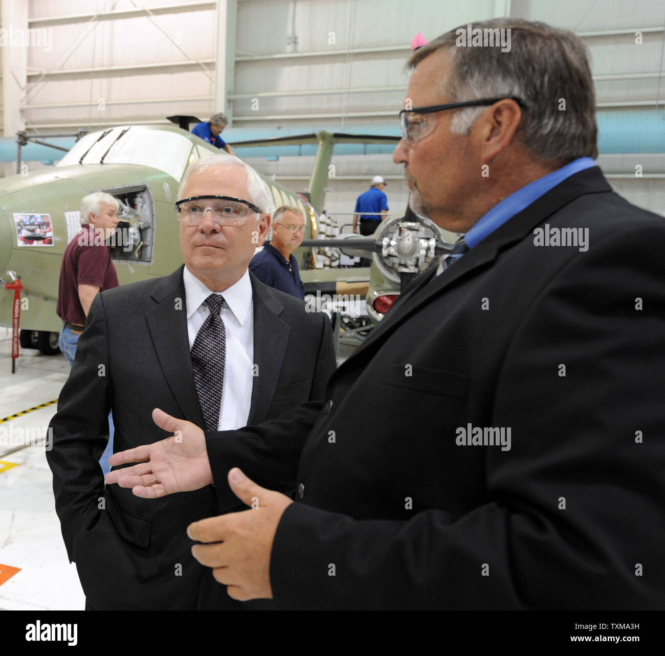 United States Secretary of Defense Robert M. Gates, gets an update from ...