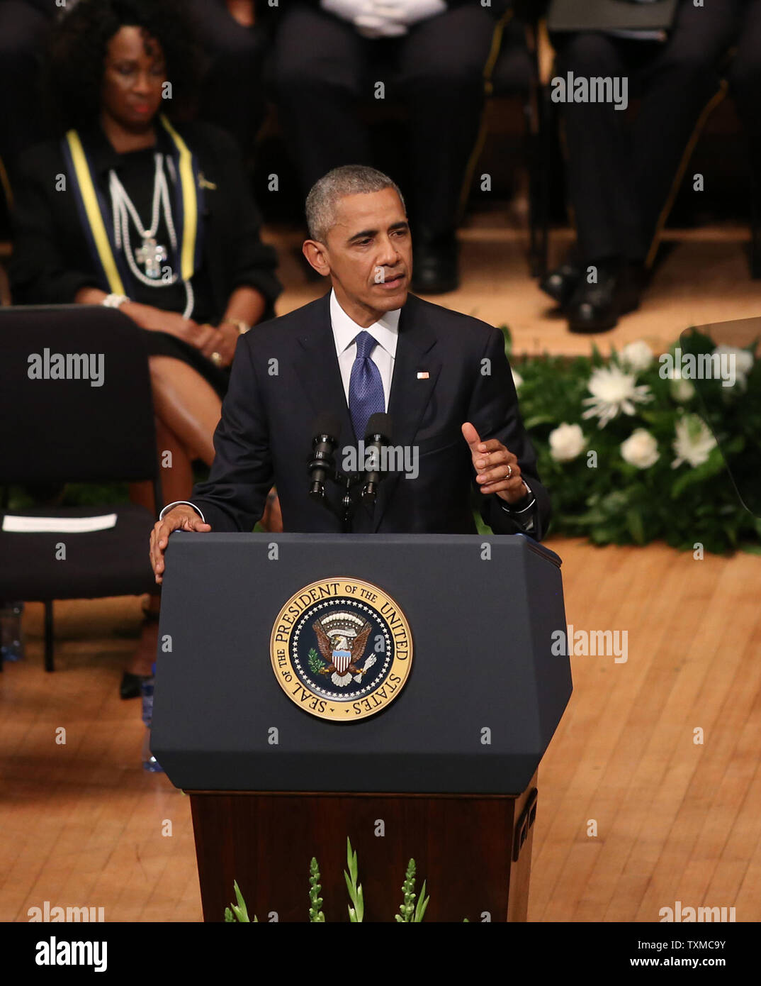 President Barack Obama delivers remarks during an interfaith memorial ...