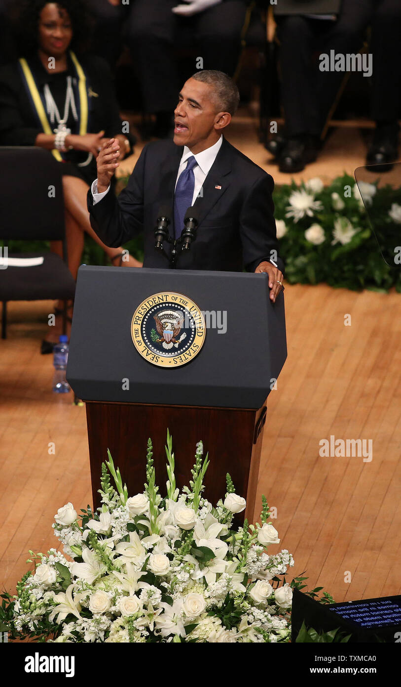 President Barack Obama delivers remarks during an interfaith memorial ...