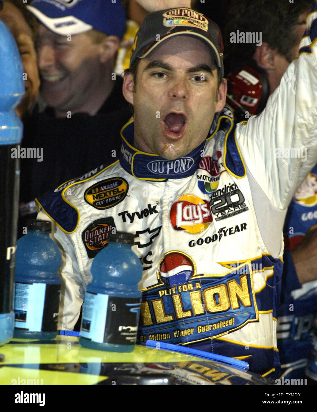 Jeff Gordon celebrates winning the NASCAR Nextel Cup Pepsi 400, at ...