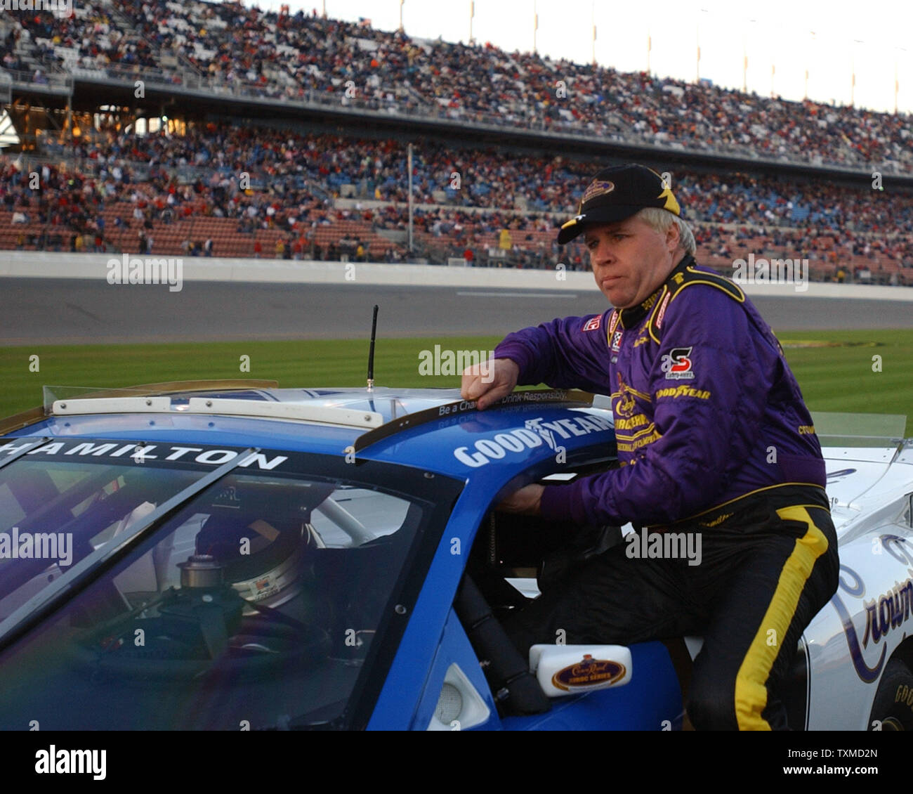 Bobby Hamilton climbs into his car before the running of the Crown ...