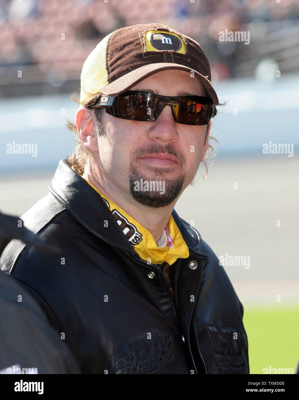Elliott Sadler stands on pit road after qualifying 4th for the NASCAR ...